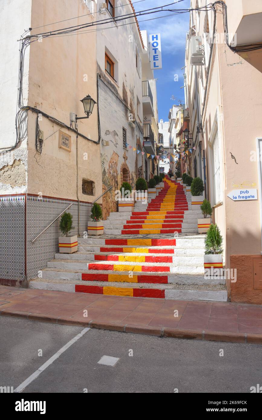 Steps painted in the colour of the Spanish Flag. Calpe, Alicante, Spai ...