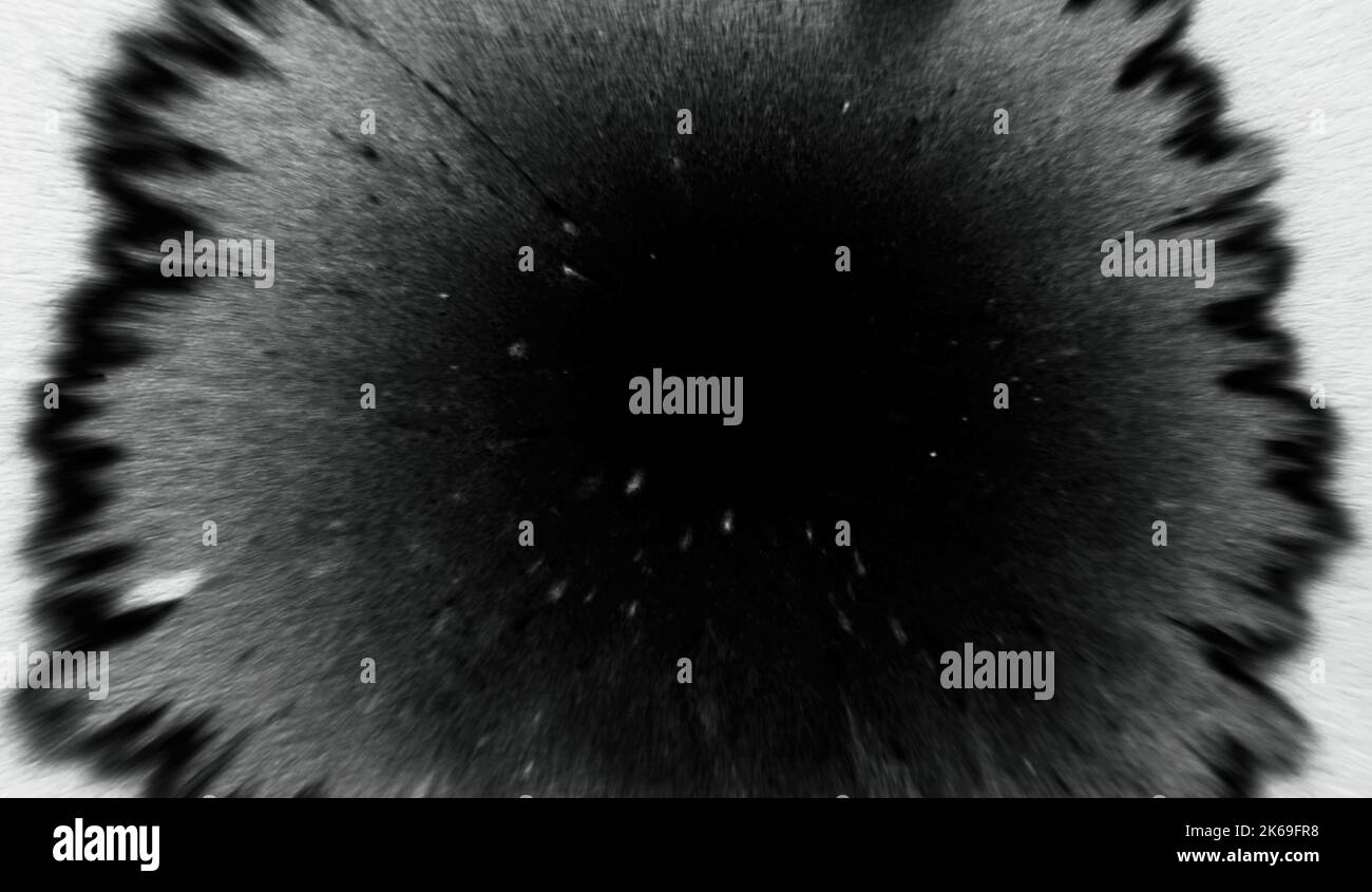 black paint drop on white paper splash overlay ink Stock Photo - Alamy