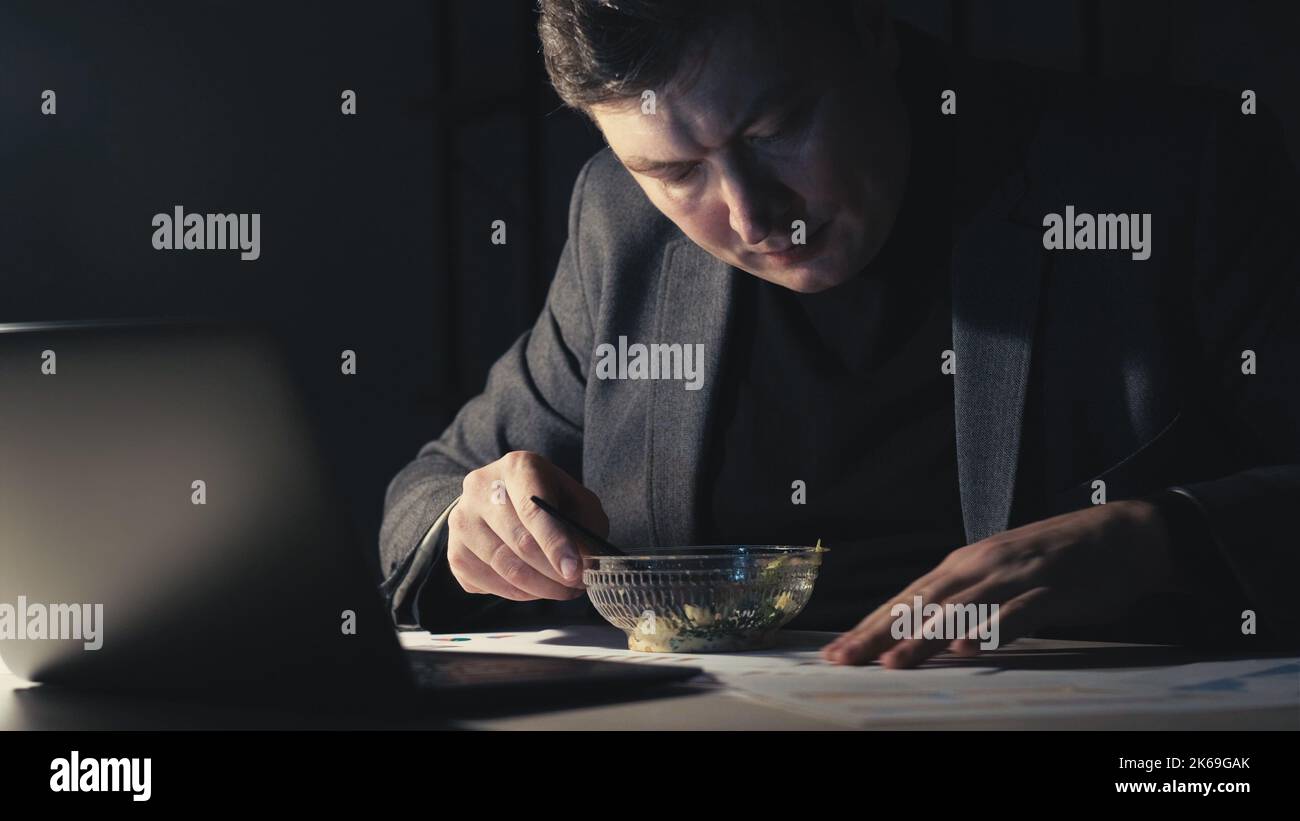 workaholic lifestyle male worker late Stock Photo - Alamy