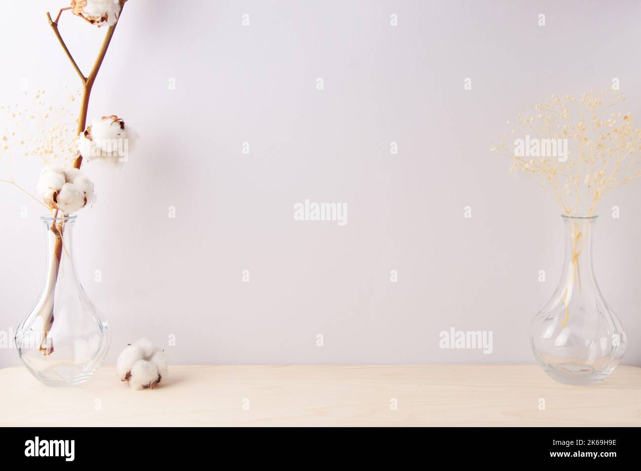 Home decoration with flowers over white wall. Interior design concept ...