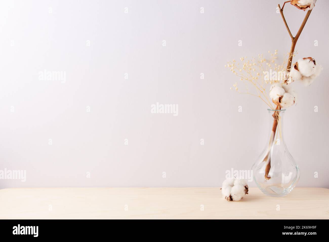 Home decoration with flowers over white wall. Interior design concept ...