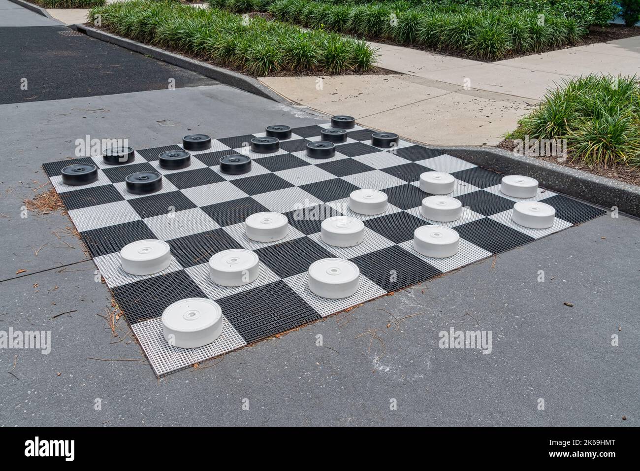 Giant outside Draughts - Checkers board game Stock Photo - Alamy