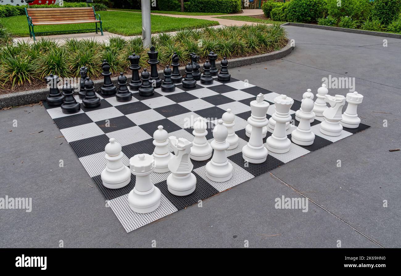 Giant outside chess board game Stock Photo - Alamy