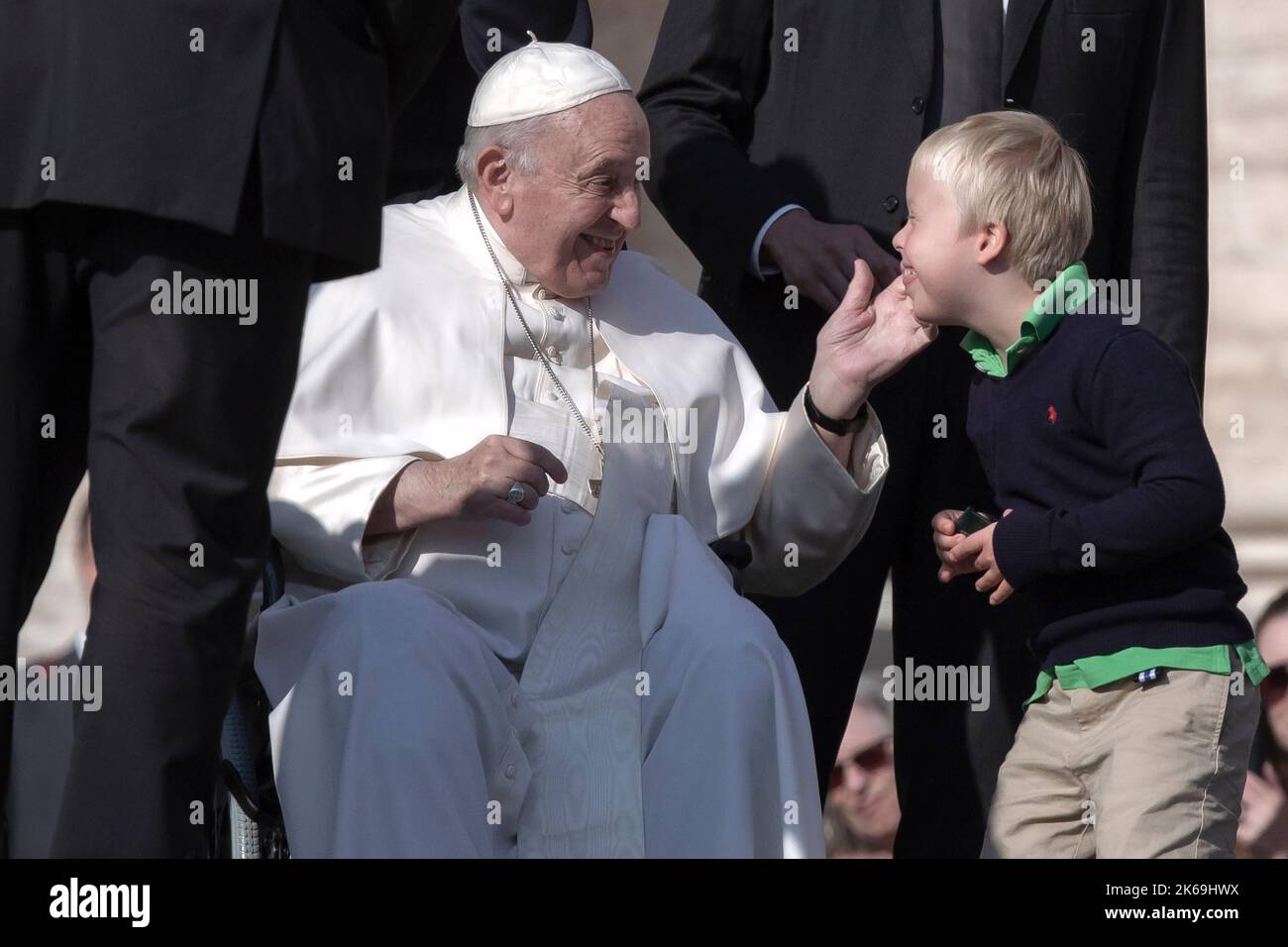 Vatican City, Vatican, 12 October, 2022. Pope Francis greets a child ...