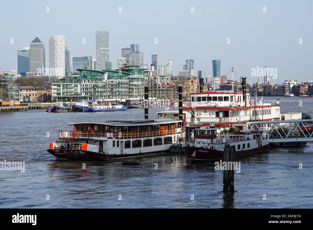 Butler's Wharf Pier on the River Thames with Canary Wharf skyscrapers ...
