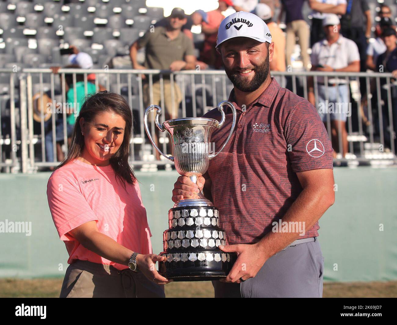 Jon Rahm of Spain holds the trophy with daughter of Severiano ...