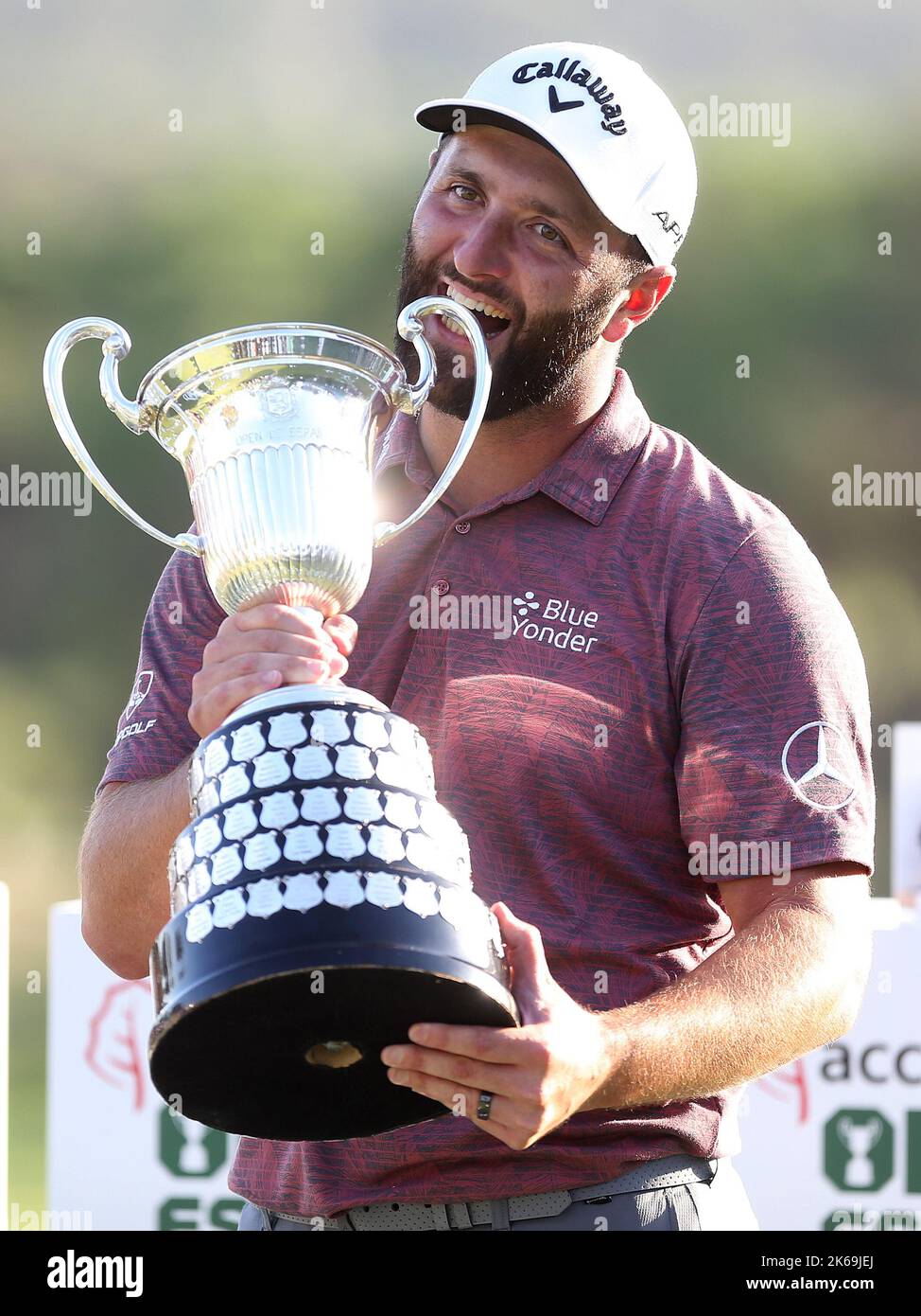 Spanish player Jon Rahm lifts the trophy at the prize giving ceremony ...