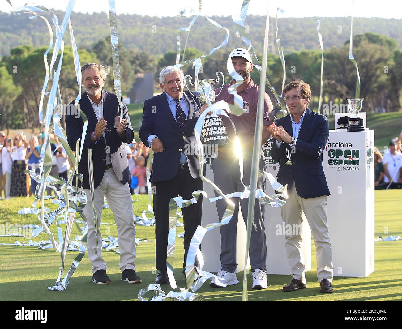 Spanish player Jon Rahm lifts the trophy at the prize giving ceremony ...