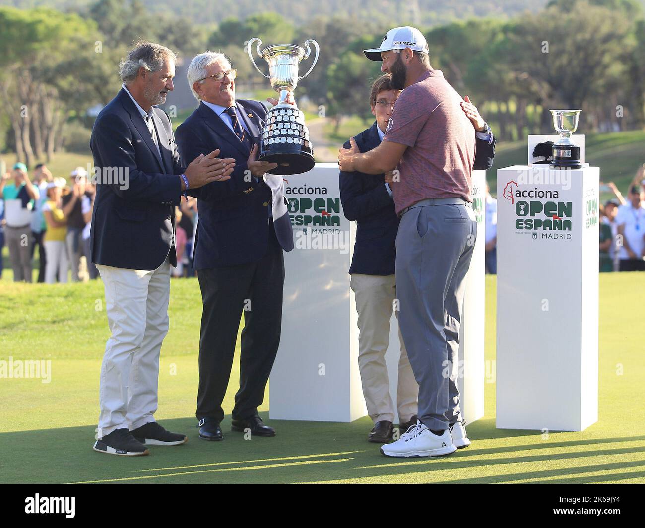 Spanish player Jon Rahm lifts the trophy at the prize giving ceremony ...