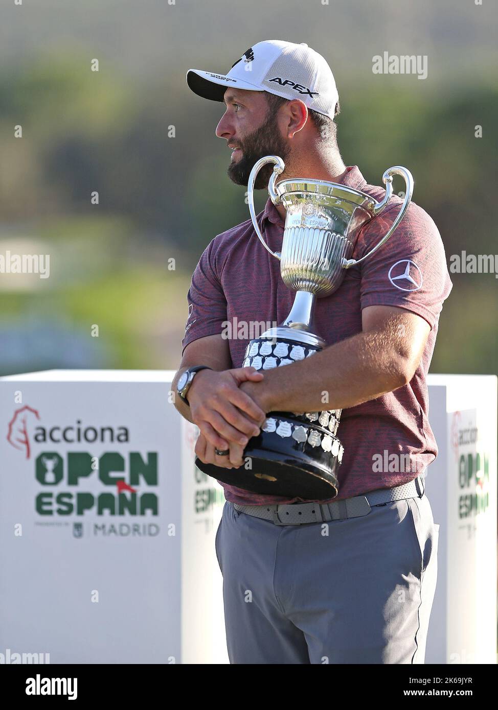 Spanish player Jon Rahm lifts the trophy at the prize giving ceremony ...