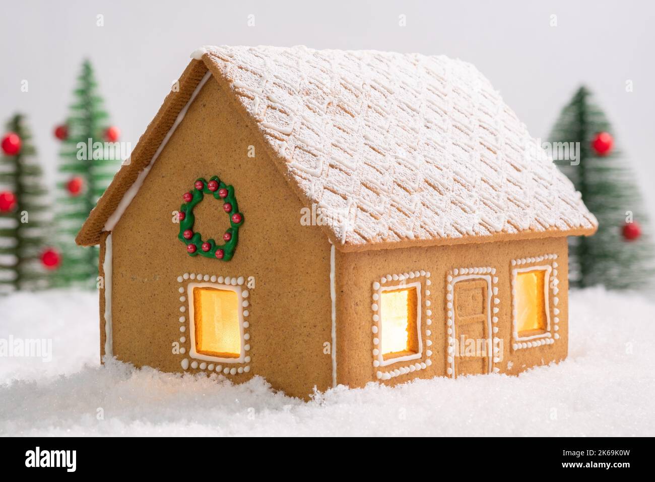 Gingerbread house in snow Stock Photo - Alamy