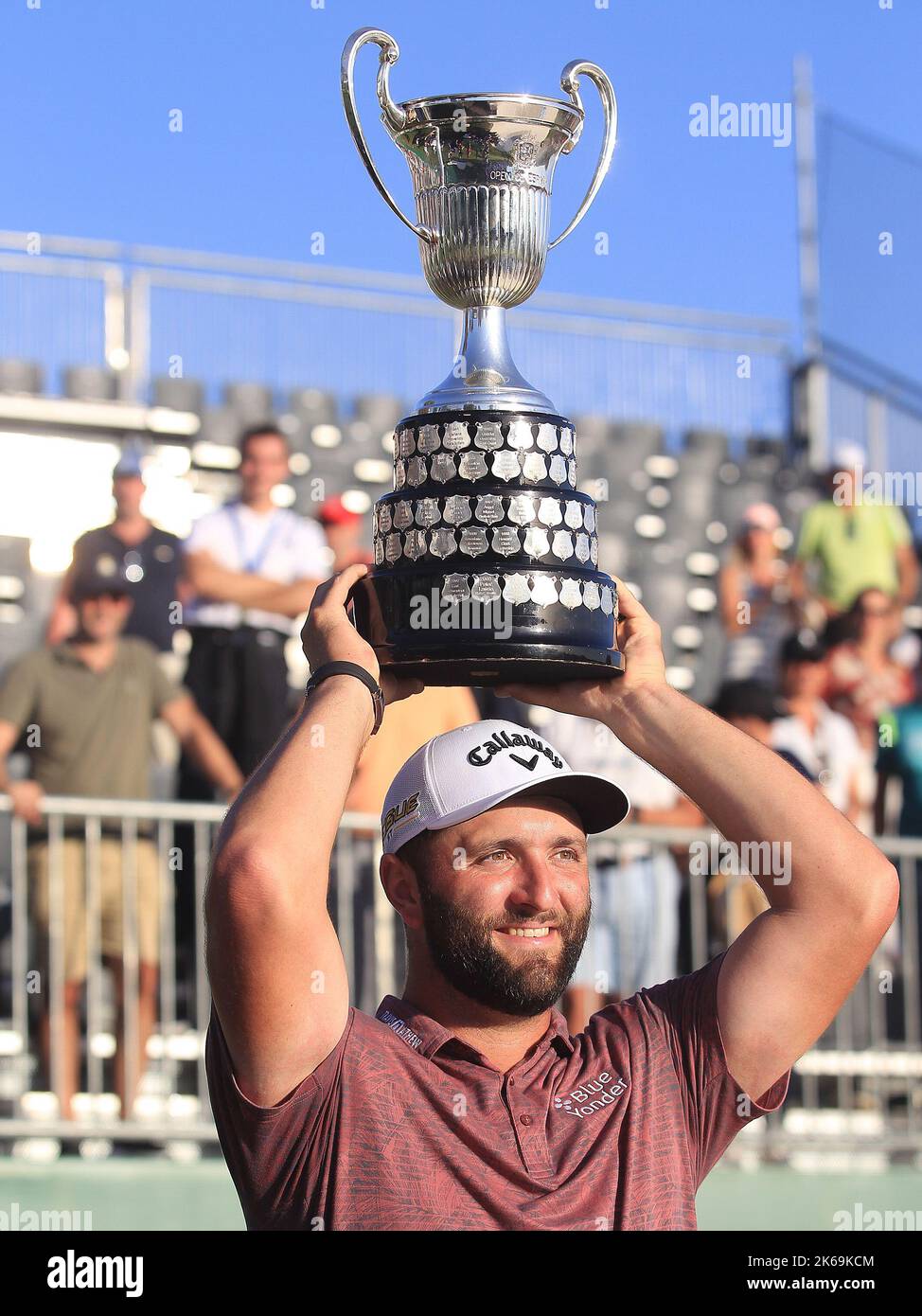 Spanish player Jon Rahm lifts the trophy at the prize giving ceremony ...