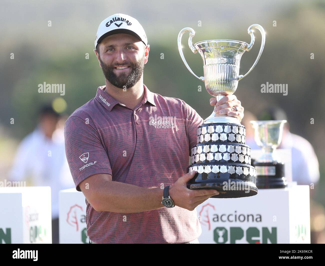Spanish player Jon Rahm lifts the trophy at the prize giving ceremony ...