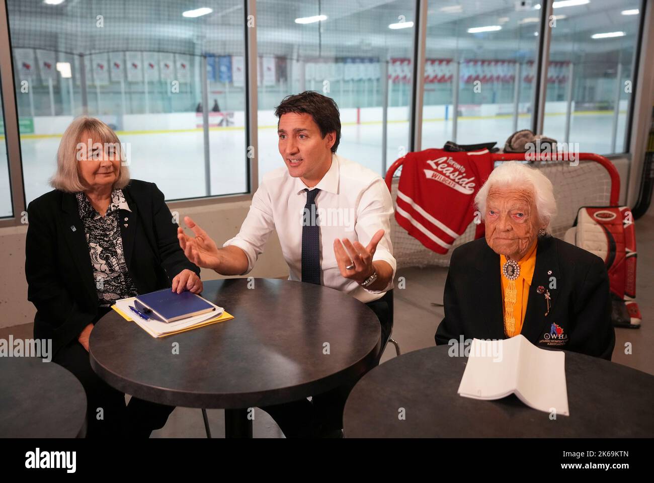Canadian Prime Minister Justin Trudeau, centre, meets with Fran Rider ...