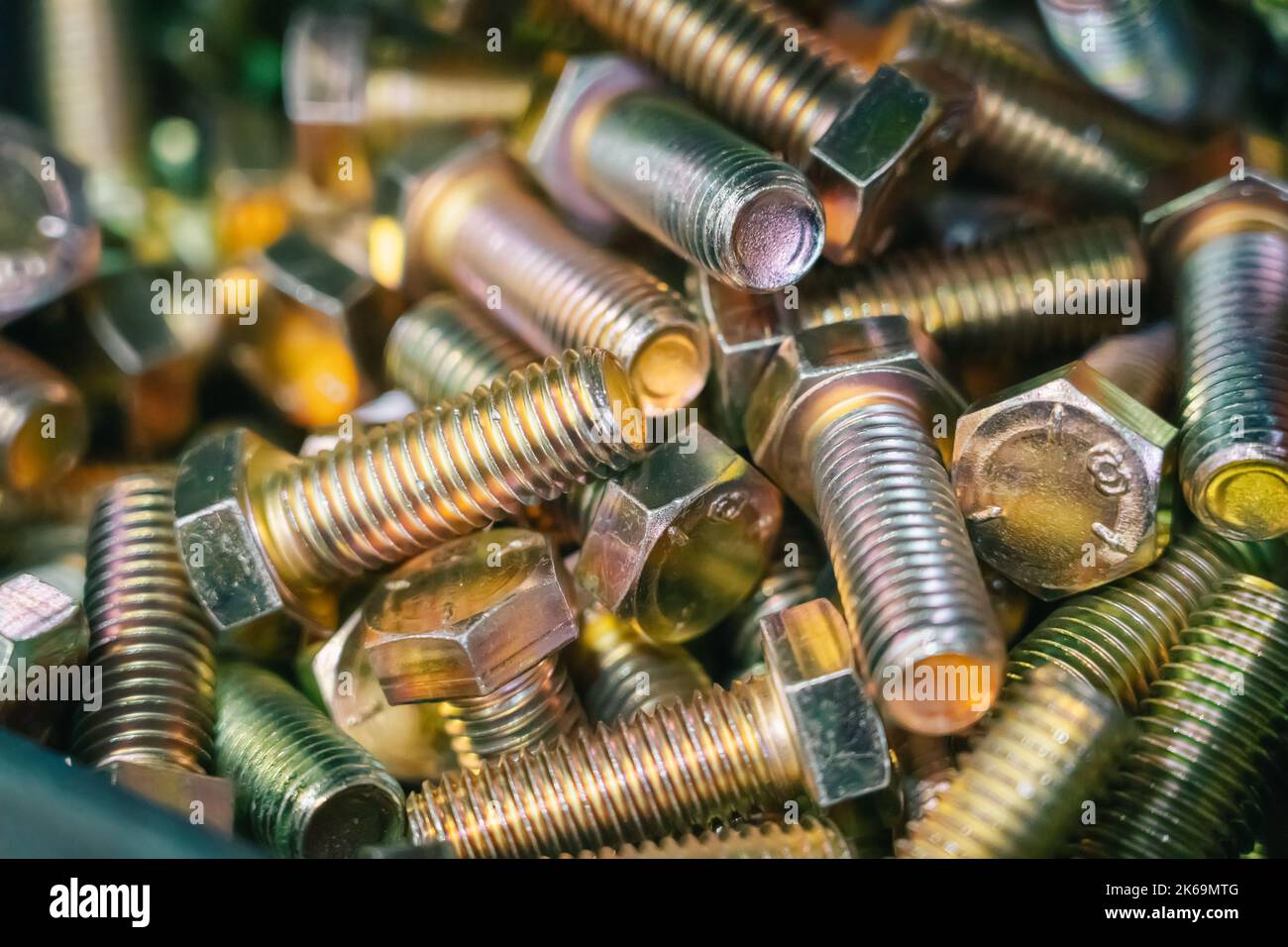 Metal screw bolts top view as industrial equipment background Stock ...