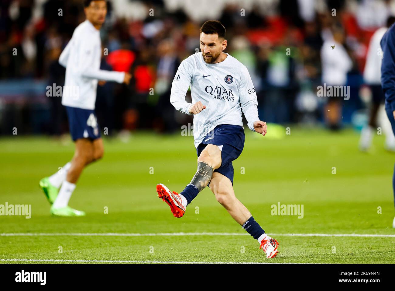 PARIS, FRANCE - OCTOBER 01: Lionel Messi of Paris Saint Germain warming ...