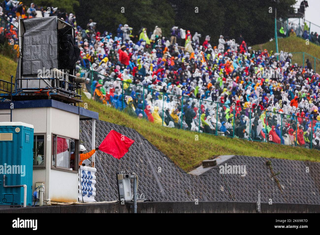 Formula 1 marshal with flag hi-res stock photography and images - Alamy