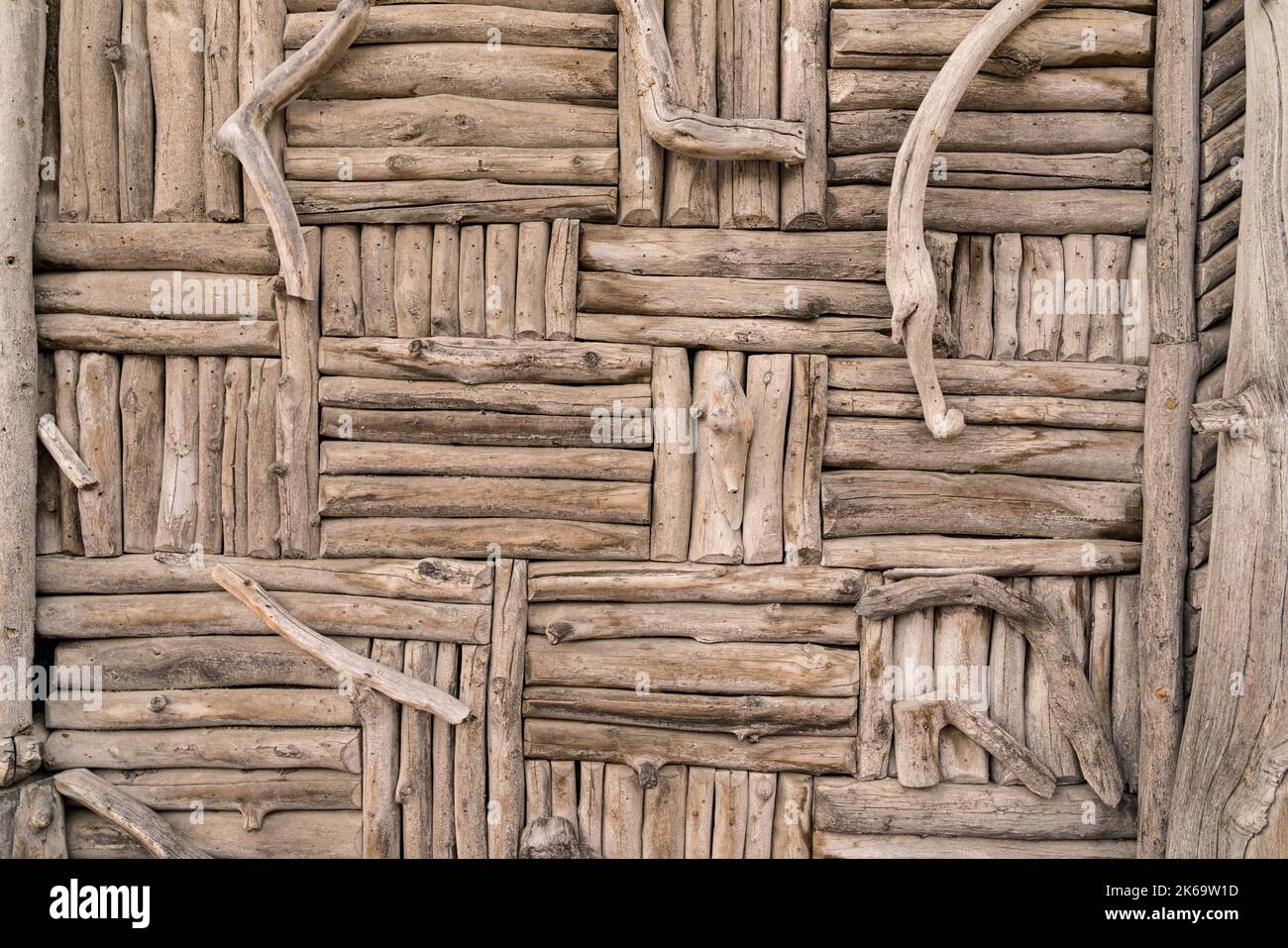 Rustic background pattern of weathered old wooden sticks and twigs on a ...
