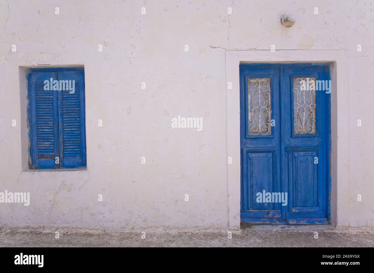 Traditional Greek architectural style building facade with white ...