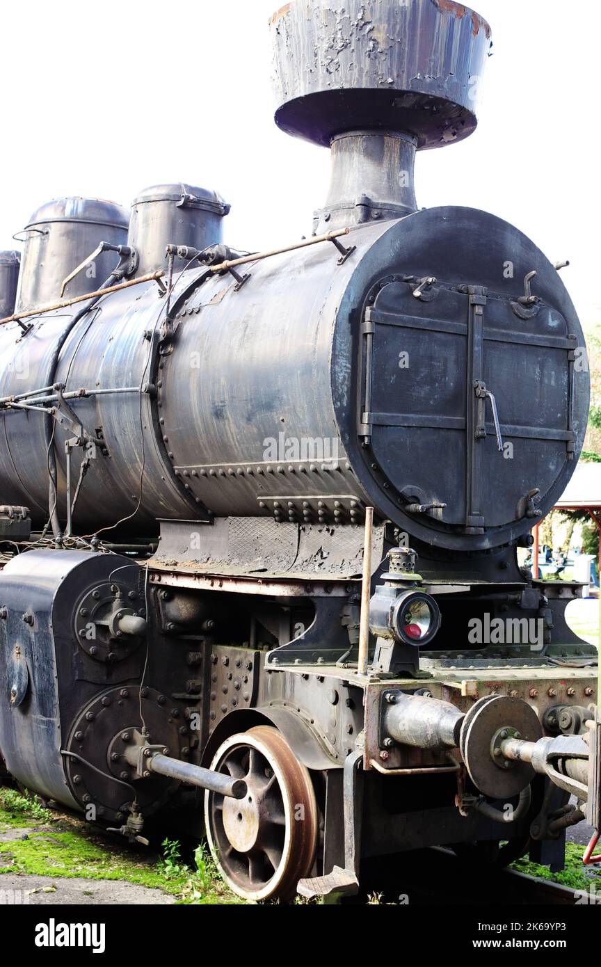 The front part of a steam locomotive. A fragment of the boiler, wheels ...