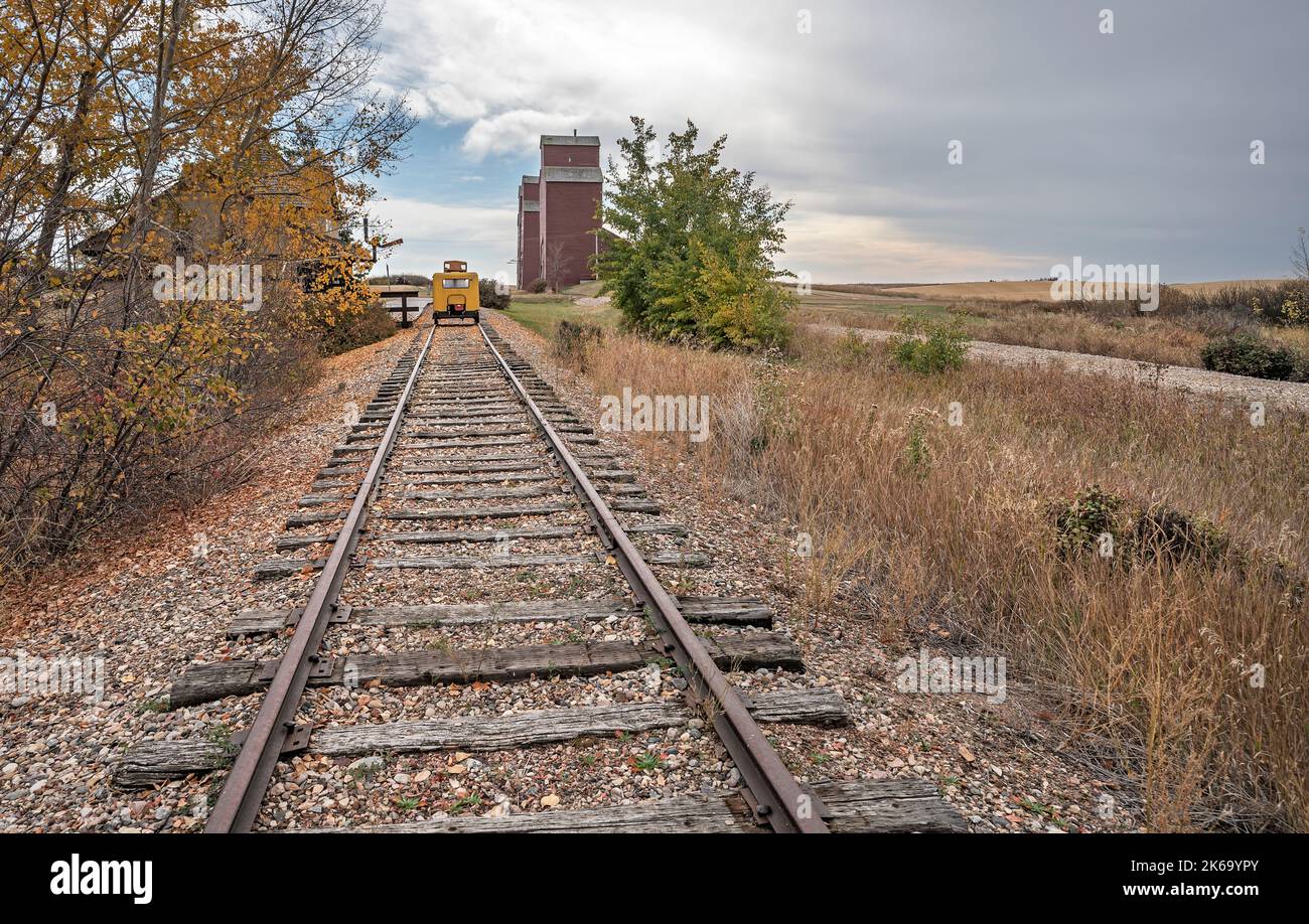 Train tracks with a speeder leading to the village of Rowley, Alberta ...