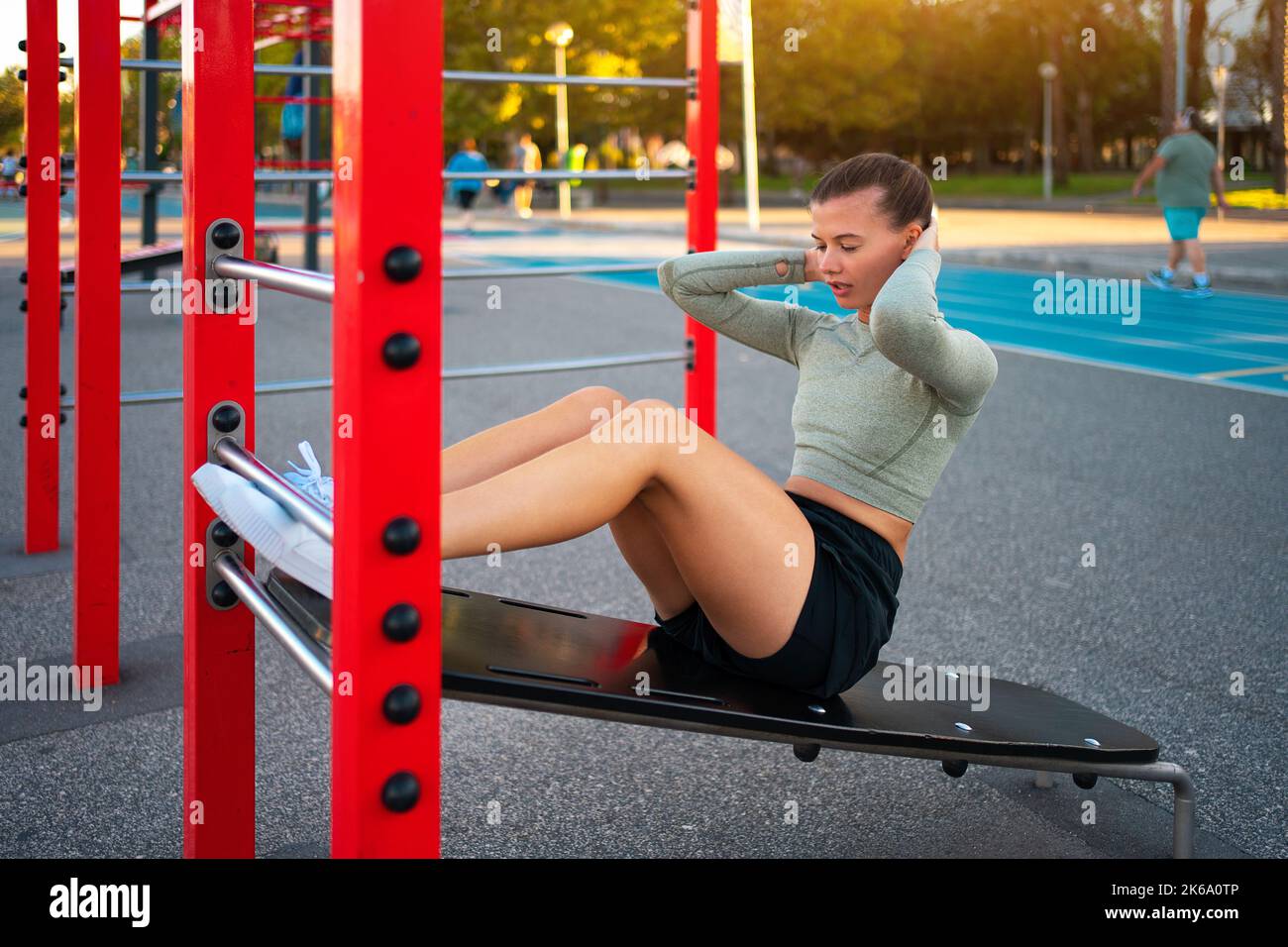 Sit-ups exercises. Active, fit sporty woman doing situps, exercising ...