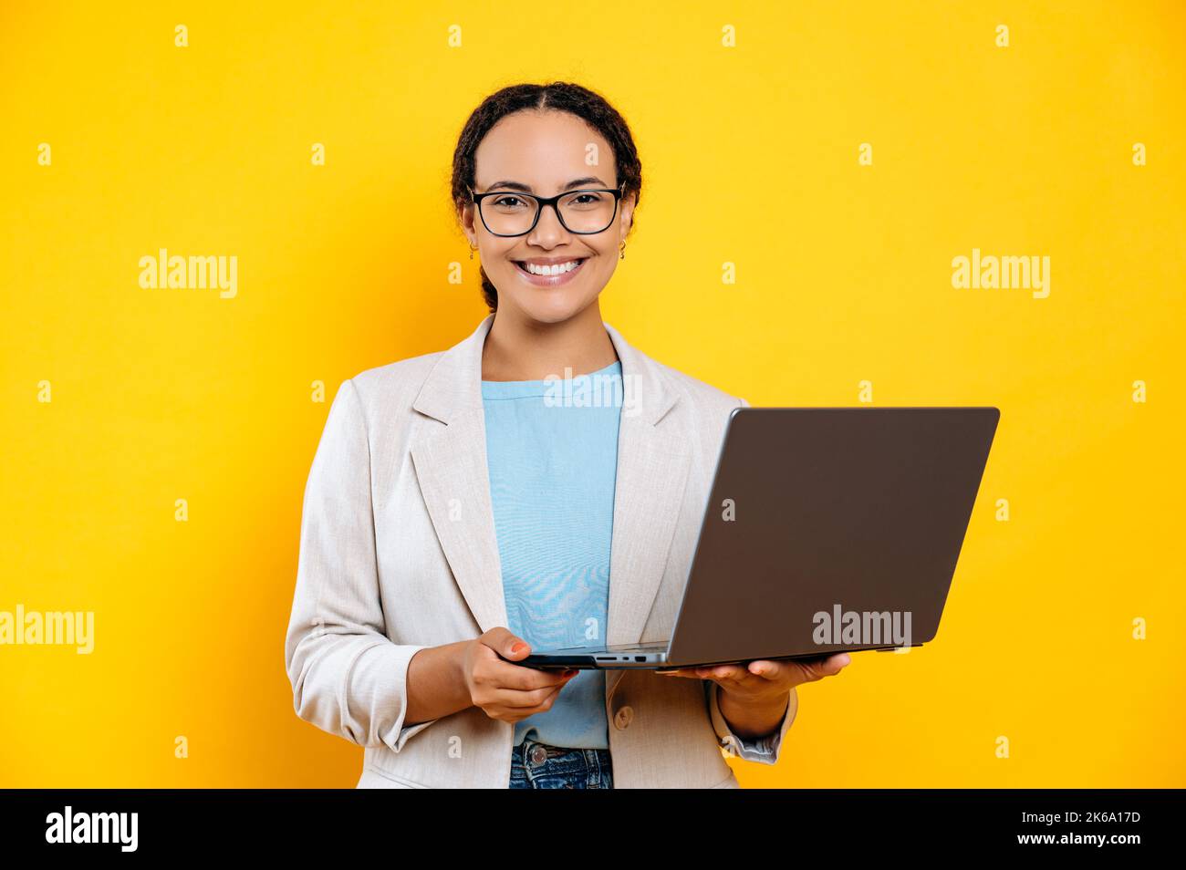 Positive confident clever lovely latino or brazilian young brunette ...