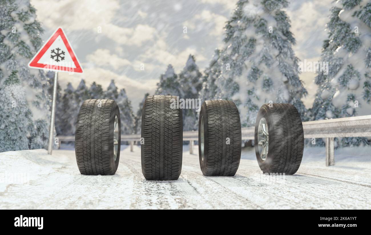 Winter tires on a snowy roadway with road sign Stock Photo - Alamy