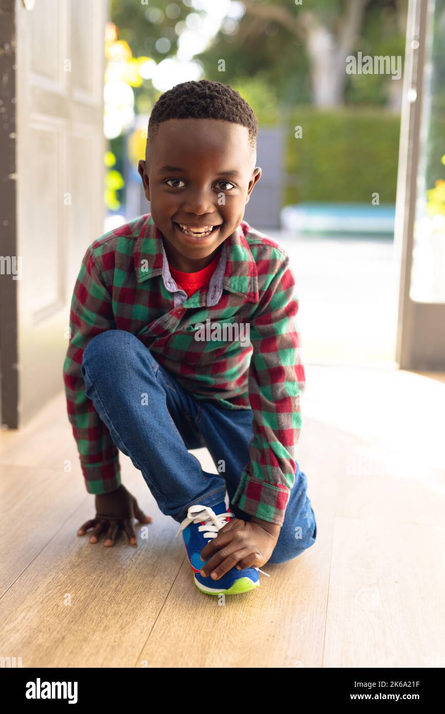 Portrait of happy african american boy looking at camera and smiling ...