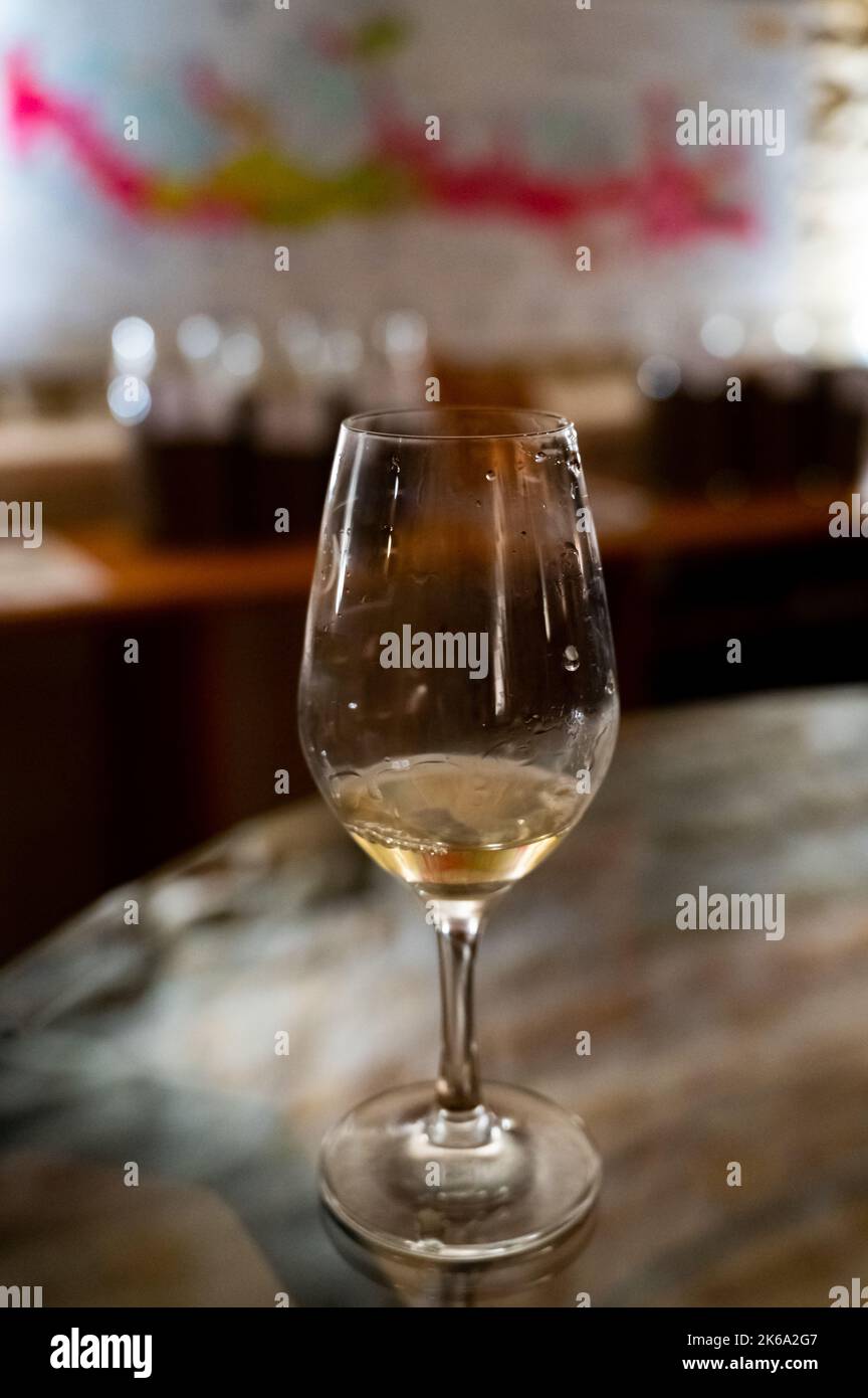 Wine tasting in underground cellars caves of French wine domain in ...