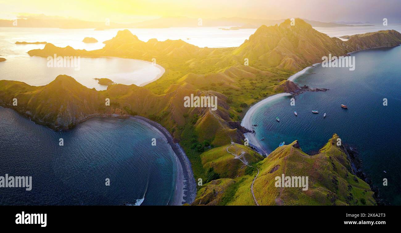 Aerial view of majestic Padar Island, with dramatic sunlight during ...