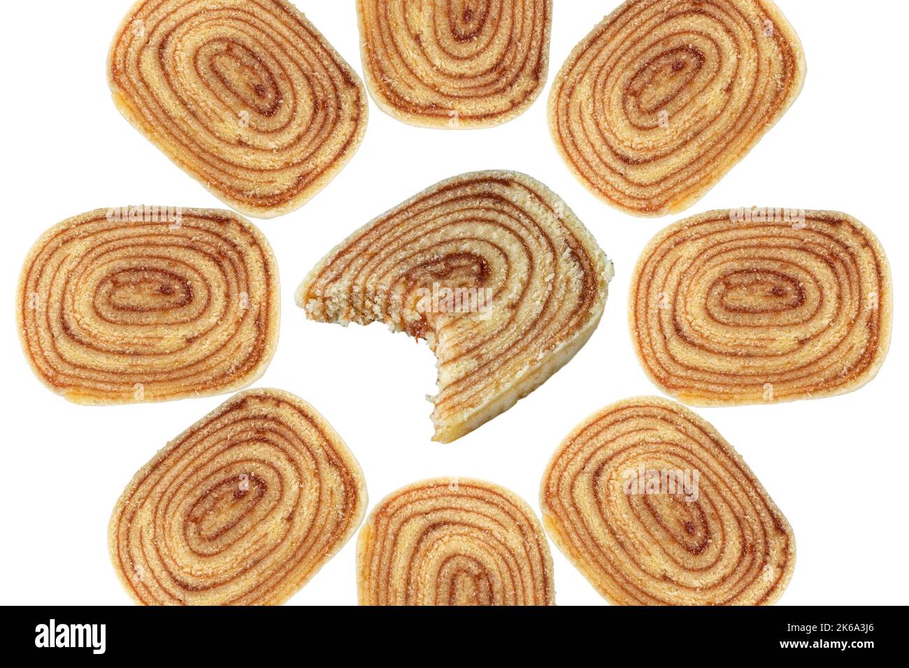 Several slices of bolo de rolo (roll cake) forming a circle with a ...