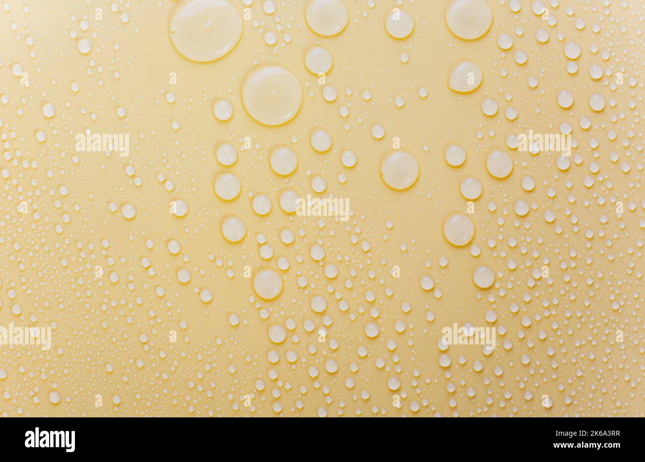 Close up of waterdrop on blue dan yellow background Stock Photo - Alamy