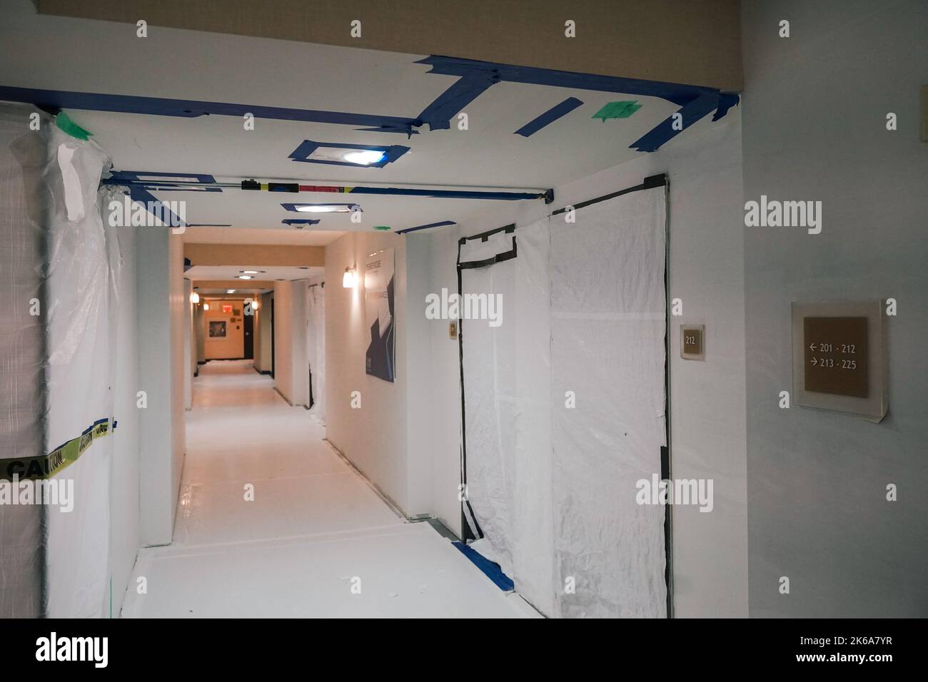 Inside of a building or hotel taped off for interior repair and ...