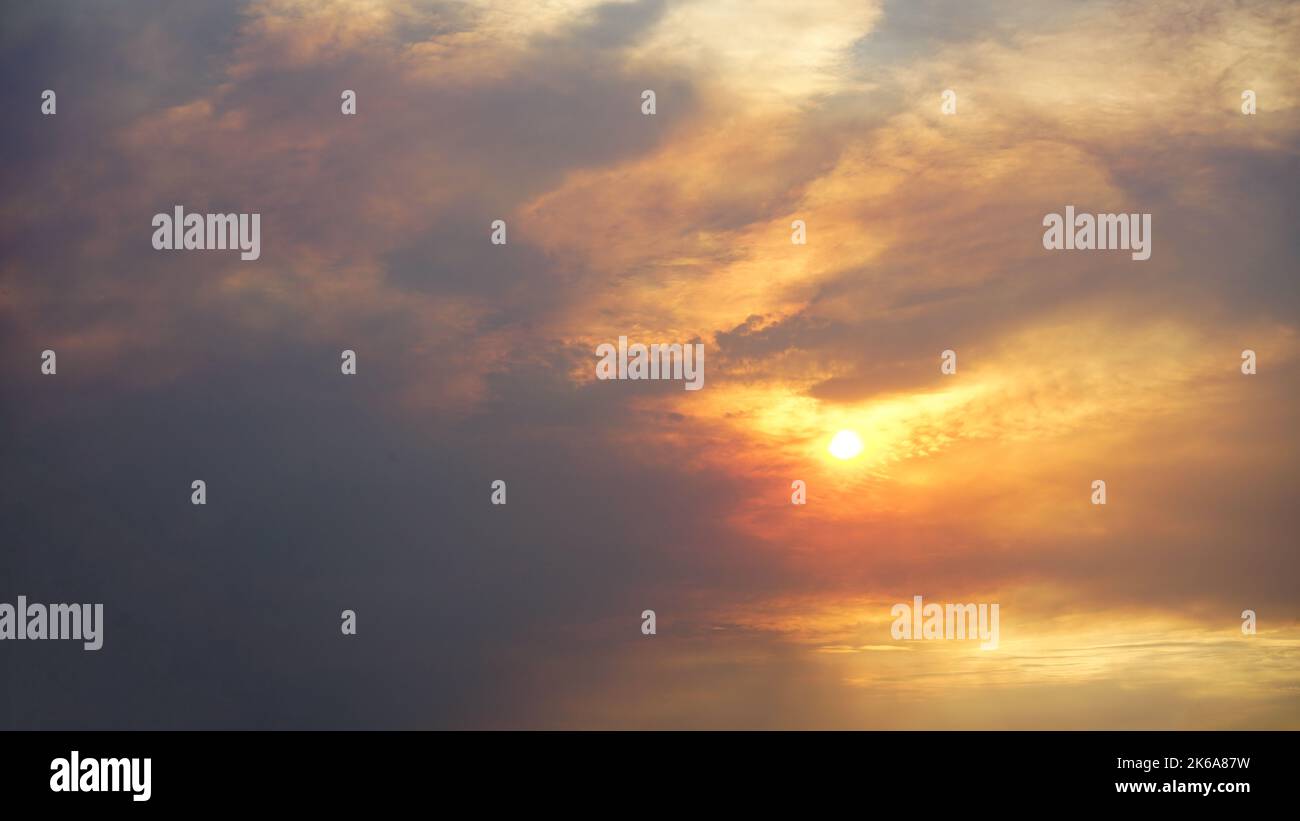 Smoke filled sky obscuring the sun during wildfires in southern ...