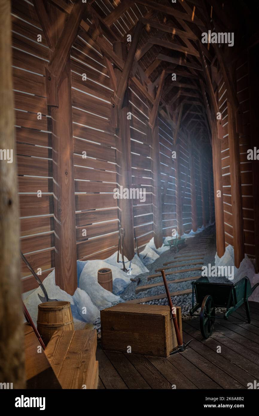painting of a wooden snowshed that was built over the tracks starting ...