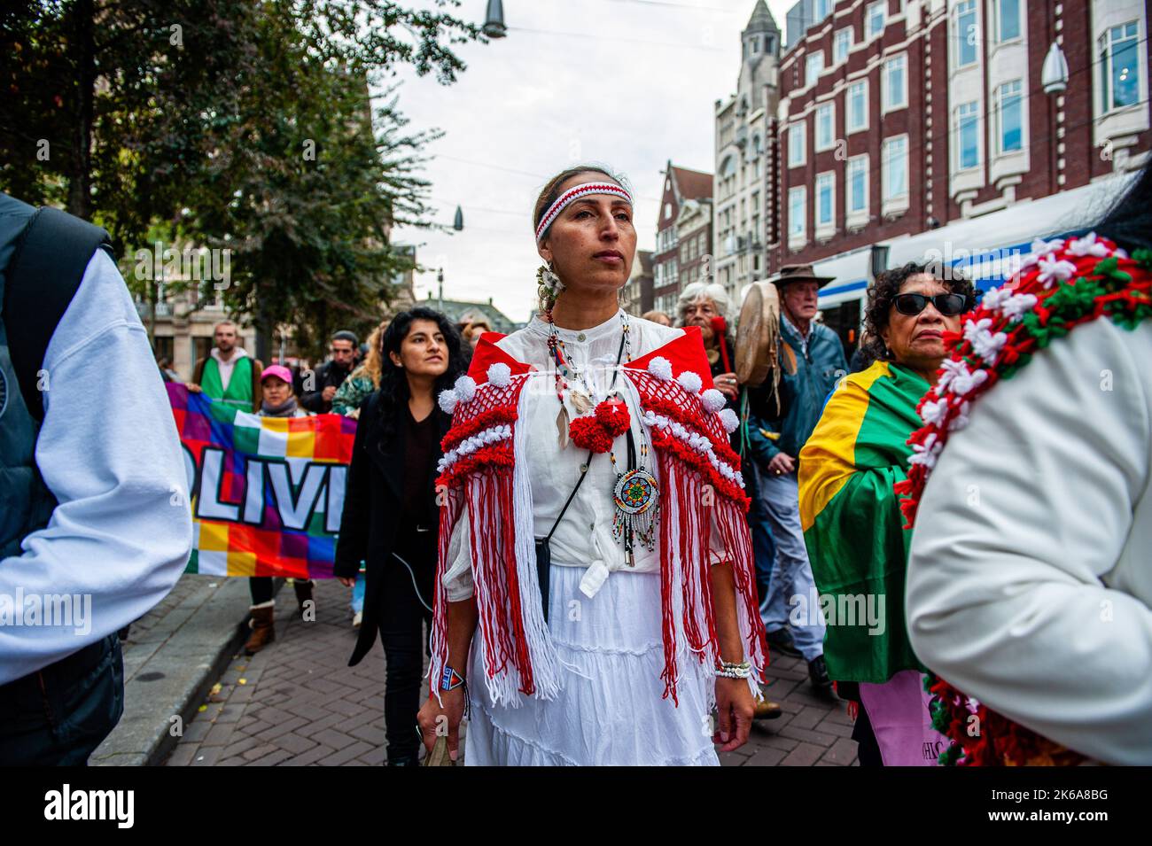 An indigenous woman is seen wearing traditional clothes during the ...