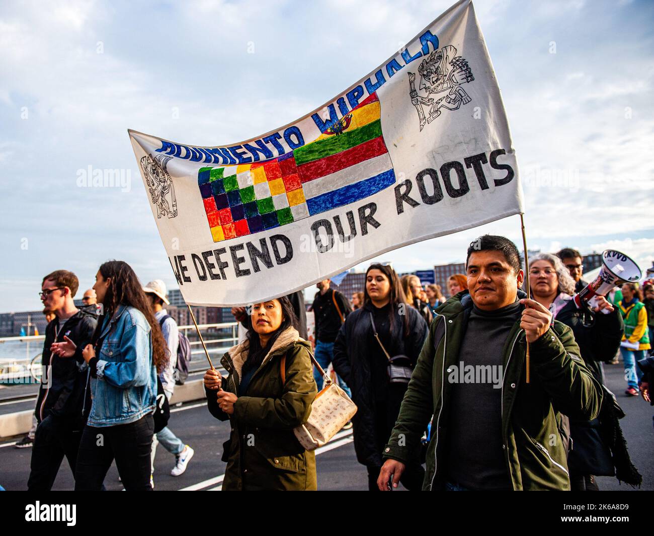 Protesters are seen holding a big banner during the demonstration. On ...