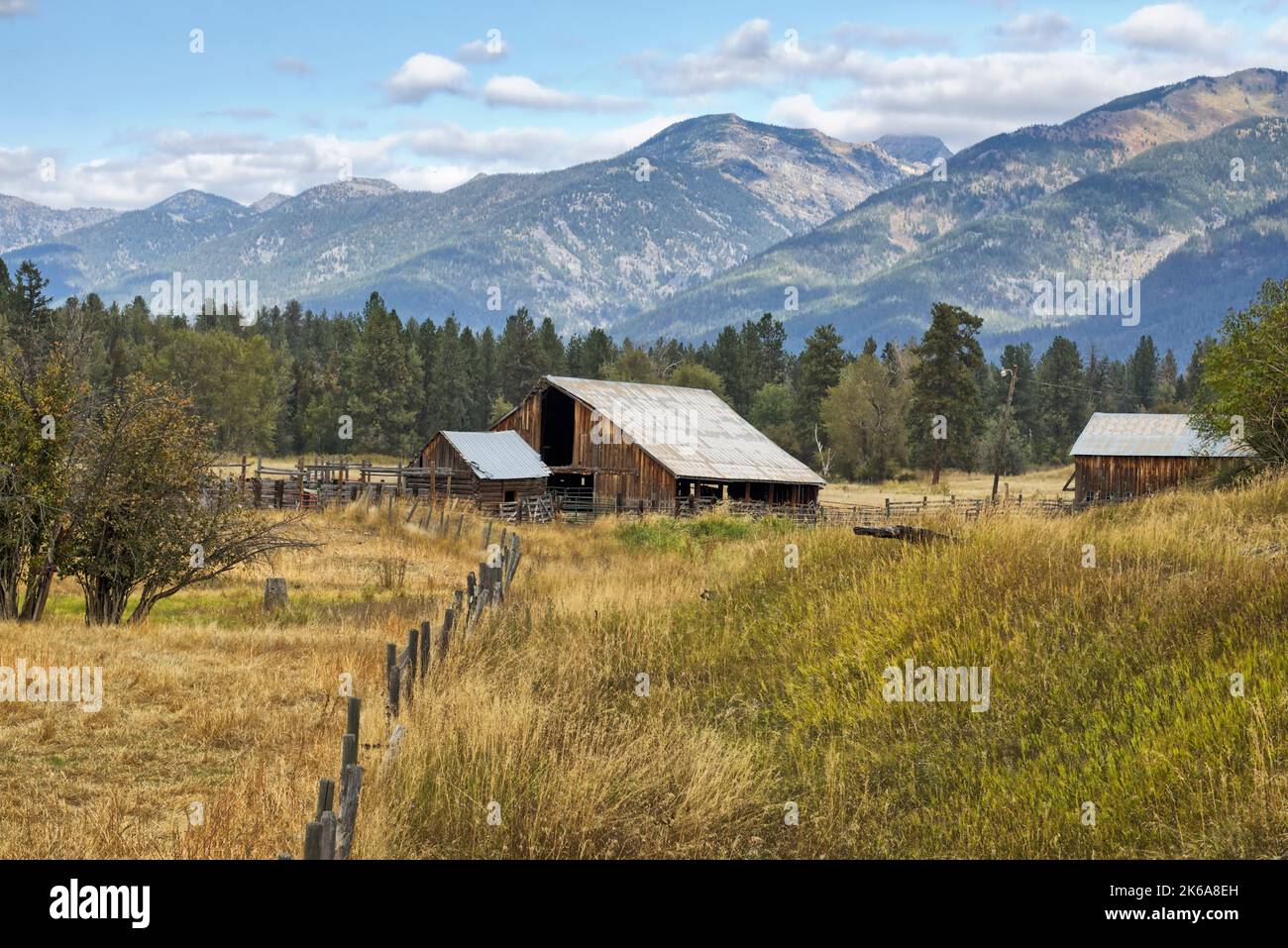 An old barn in a pasture With the MIssion mountains in the background ...