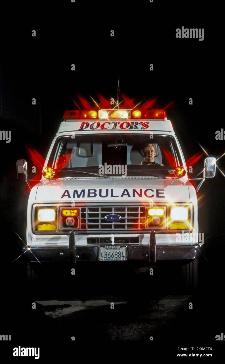 An emergency medical first responder is at the wheel of an ambulance in ...