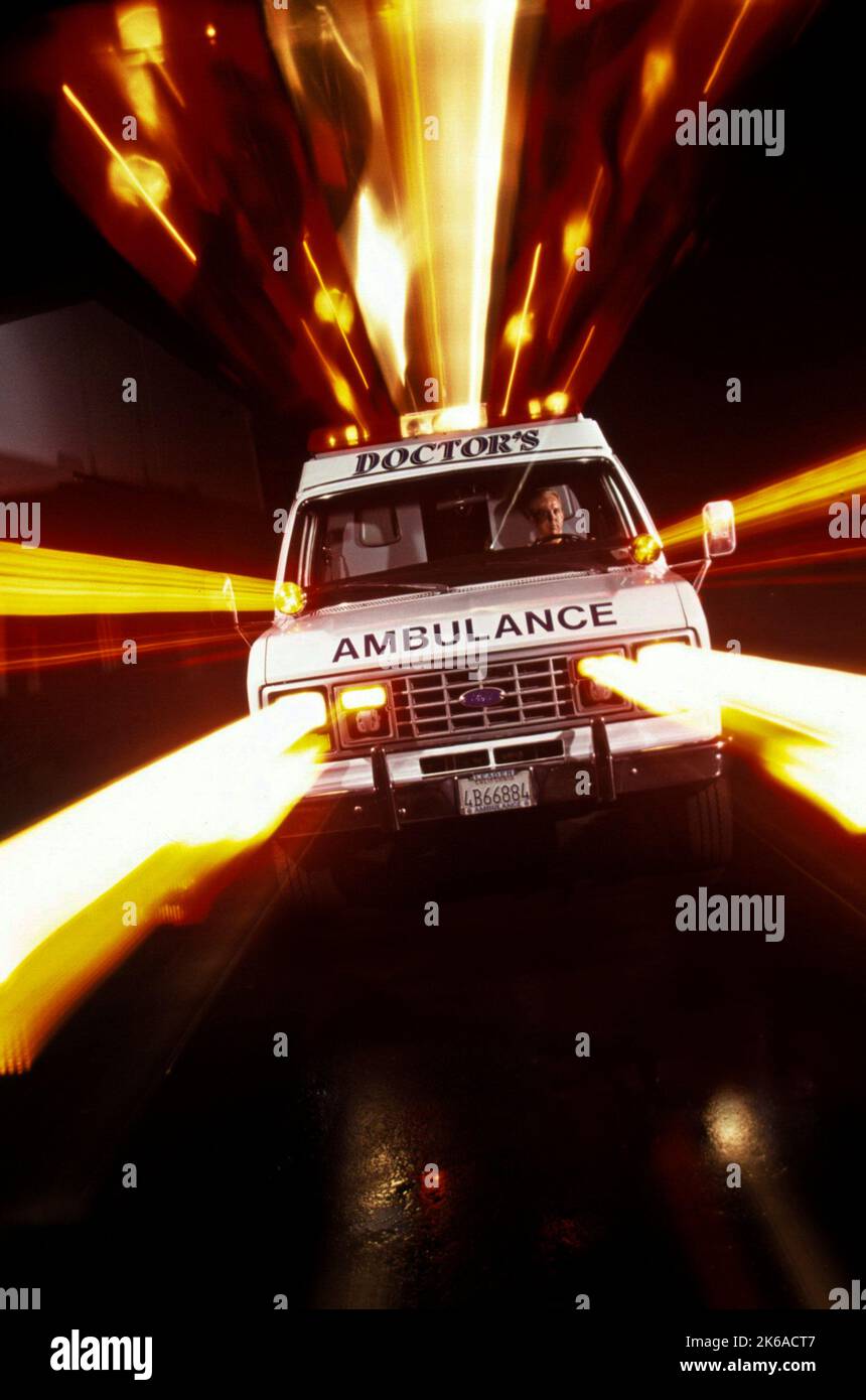 An emergency medical first responder is at the wheel of an ambulance in ...