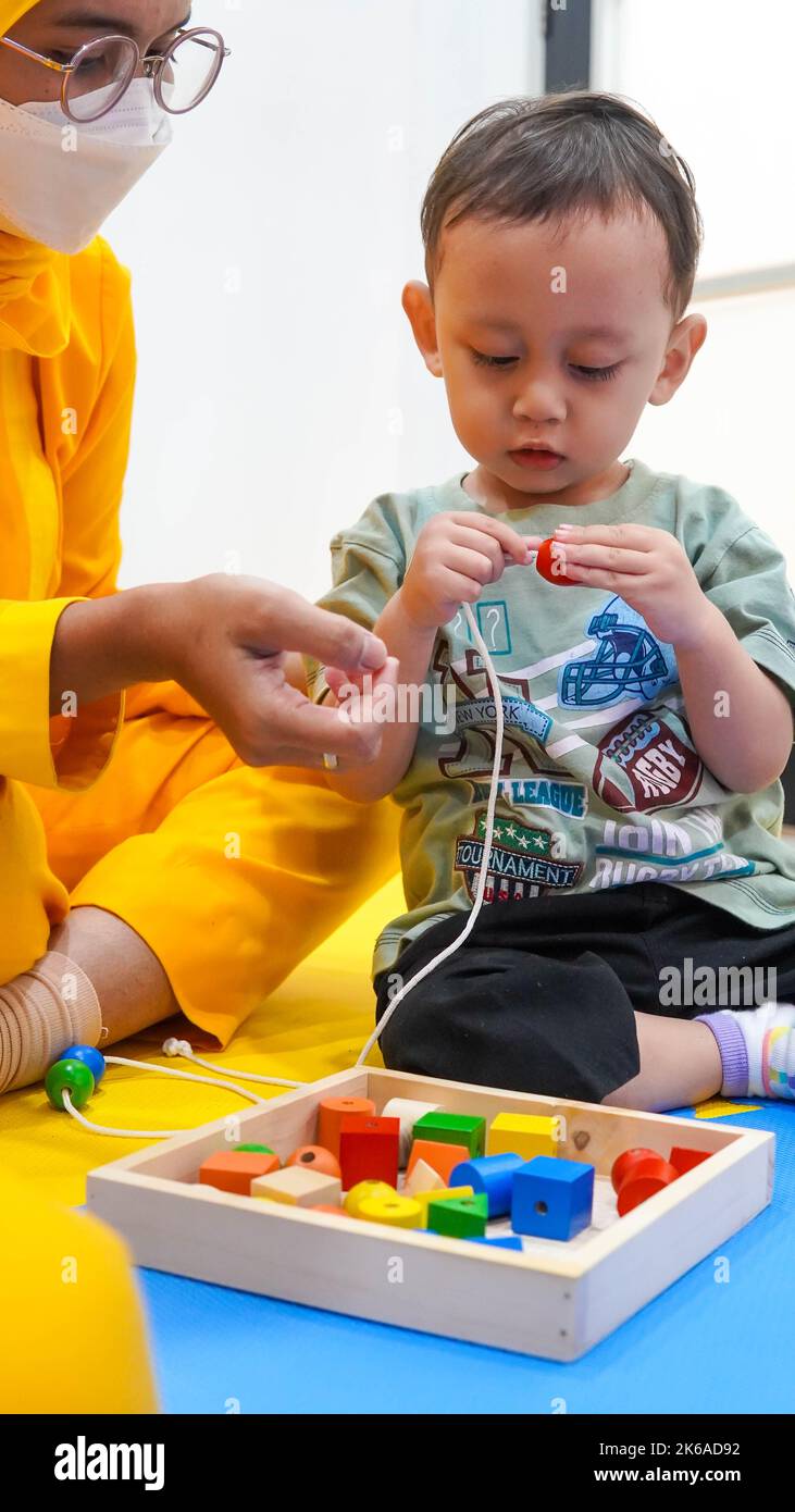 Jakarta, Indonesia 12th 2022 : Child occupational therapy session. Male ...
