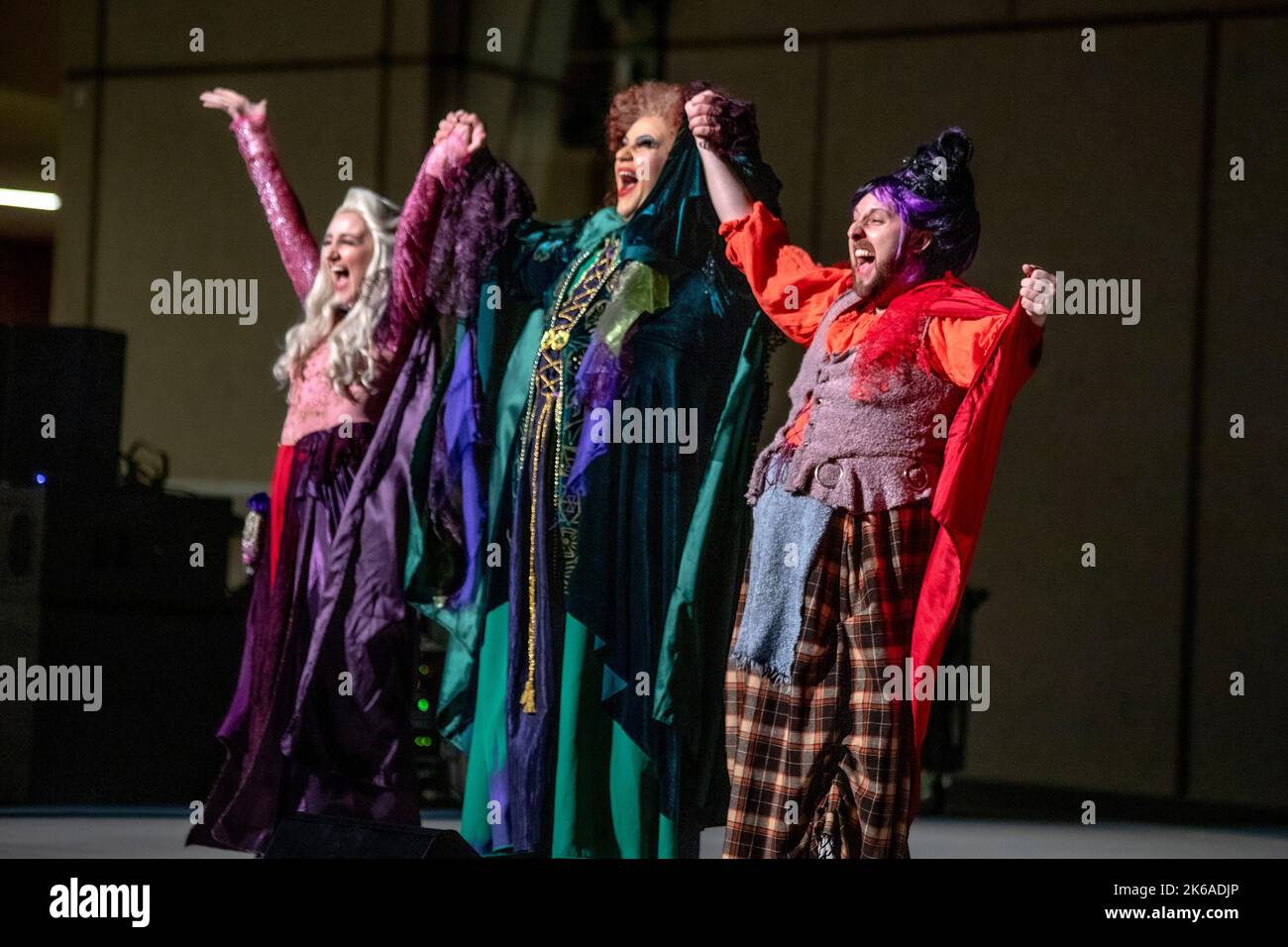Transvestite performers in a drag queen show entertain an audience in ...