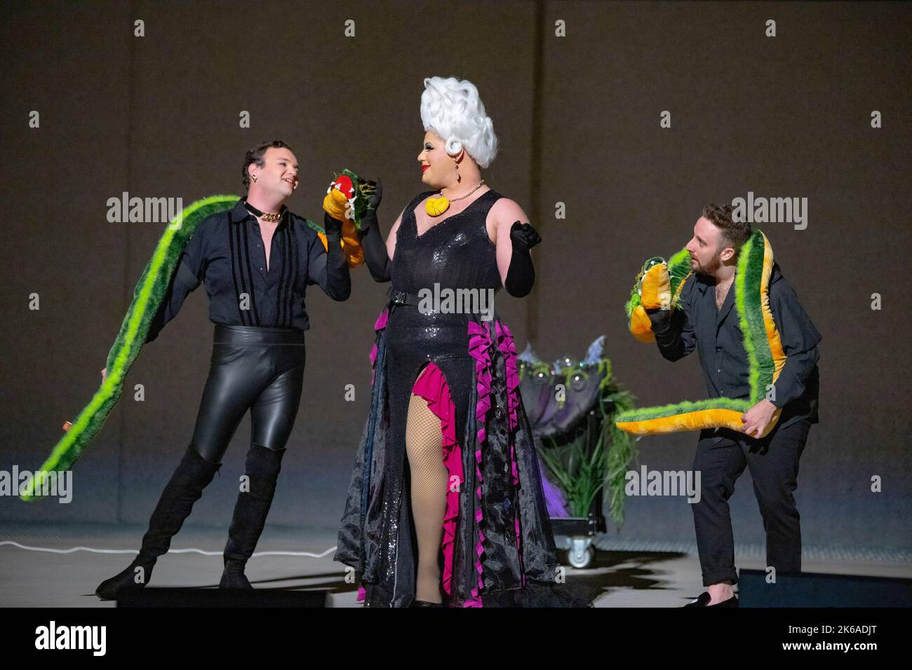 Transvestite and straight performers in a drag queen show entertain an ...