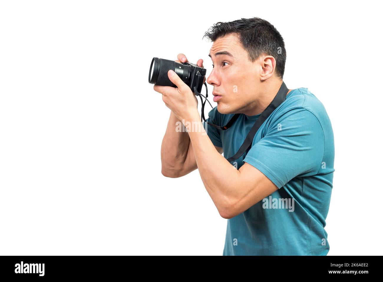 Focused photographer taking pictures on professional camera Stock Photo ...