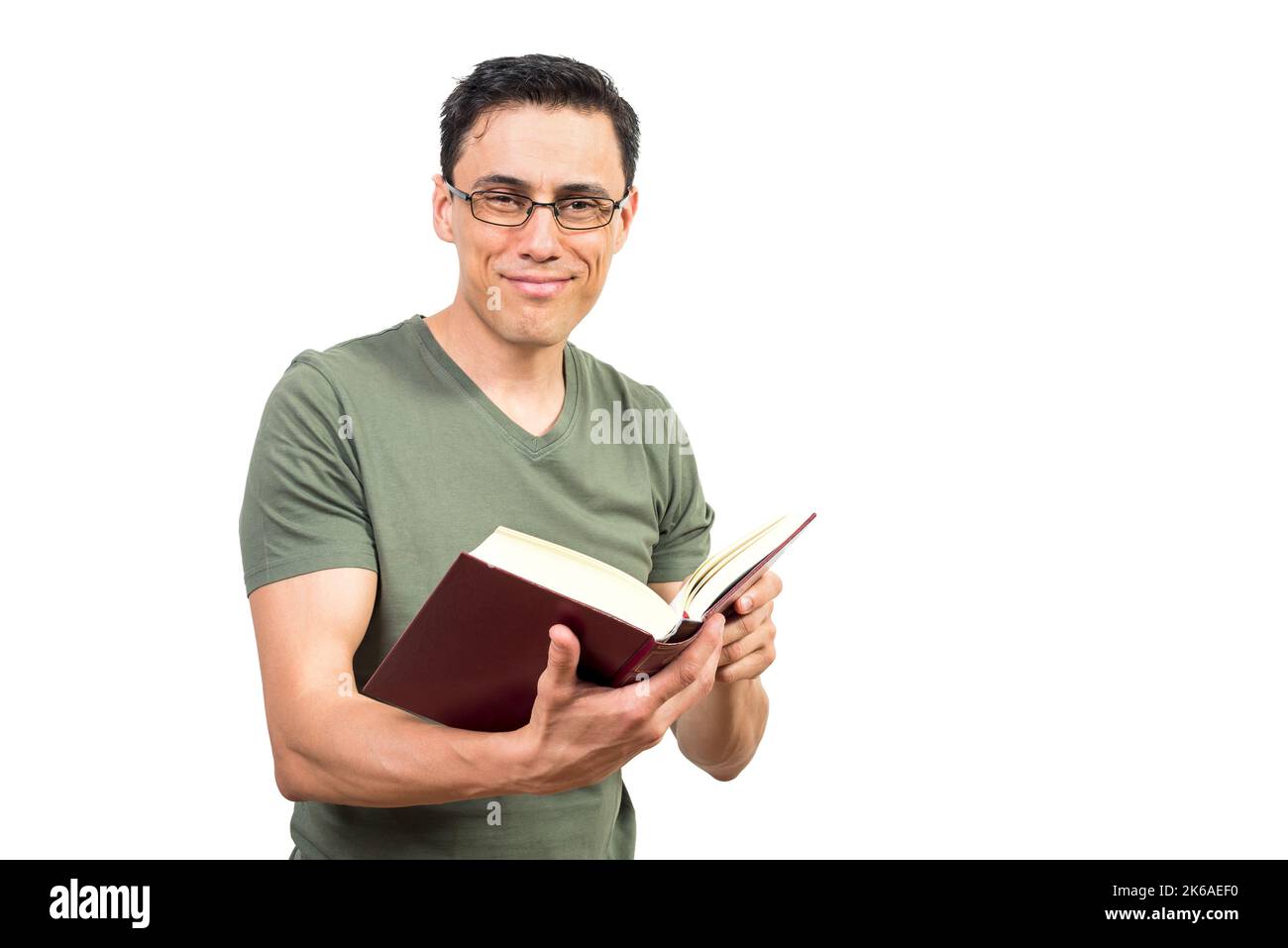 Content intelligent man reading book and looking at camera Stock Photo ...