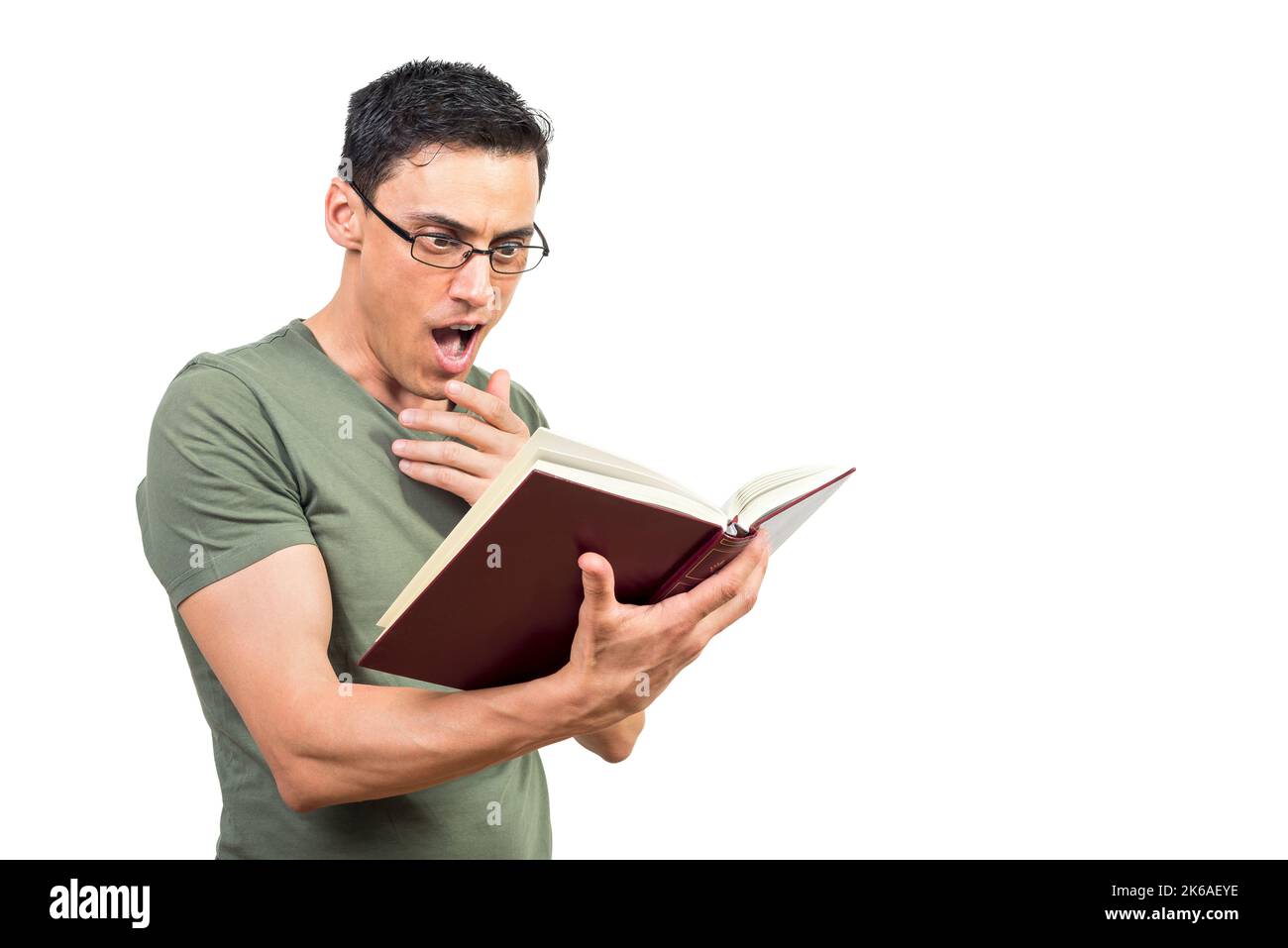 Smart man in glasses reading interesting book Stock Photo - Alamy