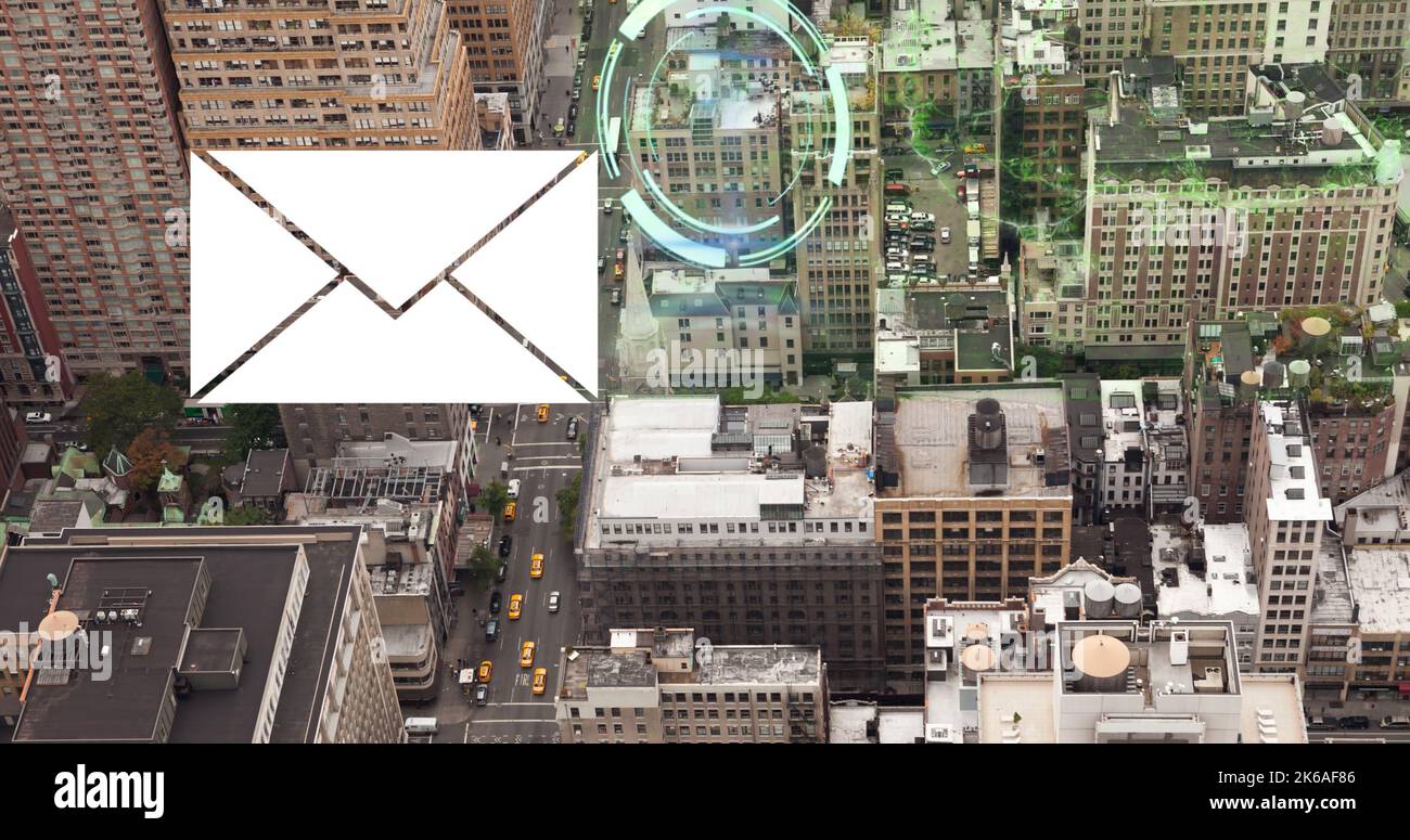 Composite of white envelope with radar over aerial view of cityscape ...