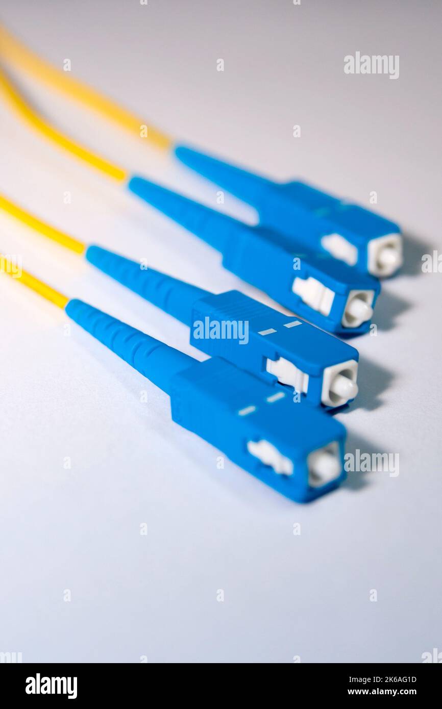 Fiber optic SC connector on white background Stock Photo - Alamy