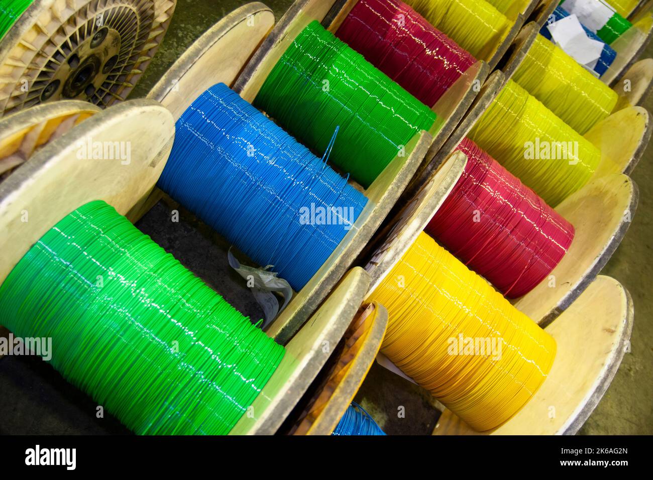 Group of fiber optic cable reels with intertwined optical fibers Stock ...